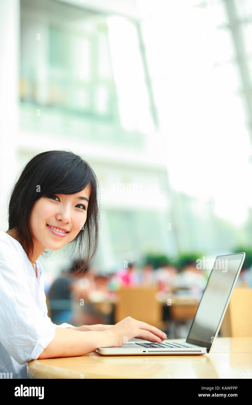 one young Chinese college student study in the college library Stock ...