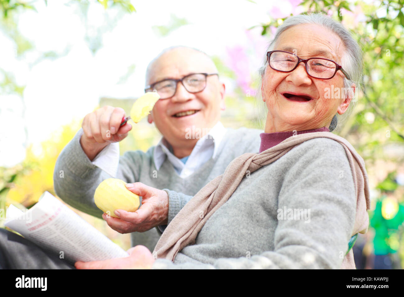 happy senior Chinese couple together in the garden outdoor daily lifestyles Stock Photo - Alamy