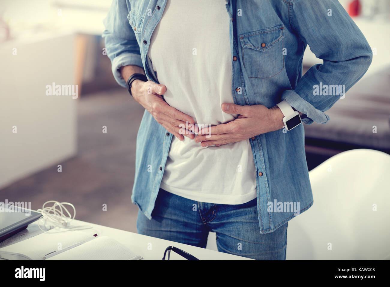 Man stomach ache close up hi-res stock photography and images - Alamy