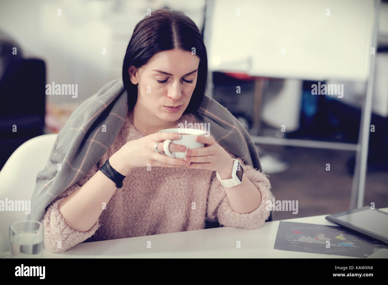 Sad cheerless woman having tea Stock Photo - Alamy