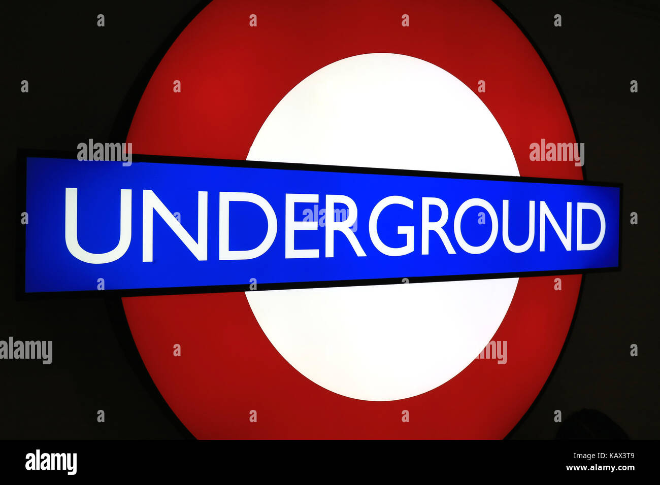 Wall Decor Illuminated Underground Sign on black Background Stock Photo ...