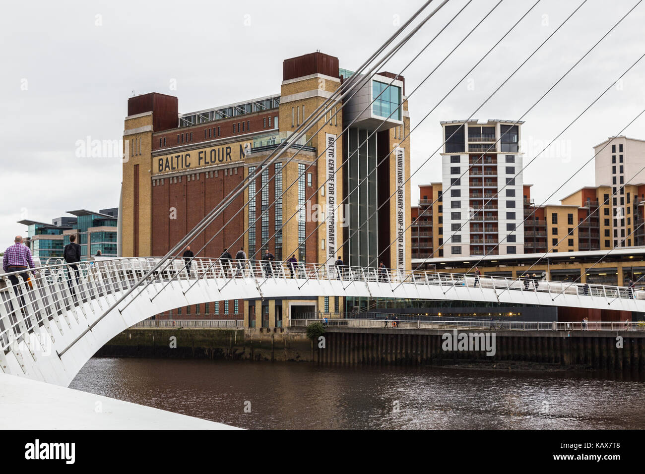 People Crossing Millennium Bridge on Quayside Newcastle-upon-Tyne with ...