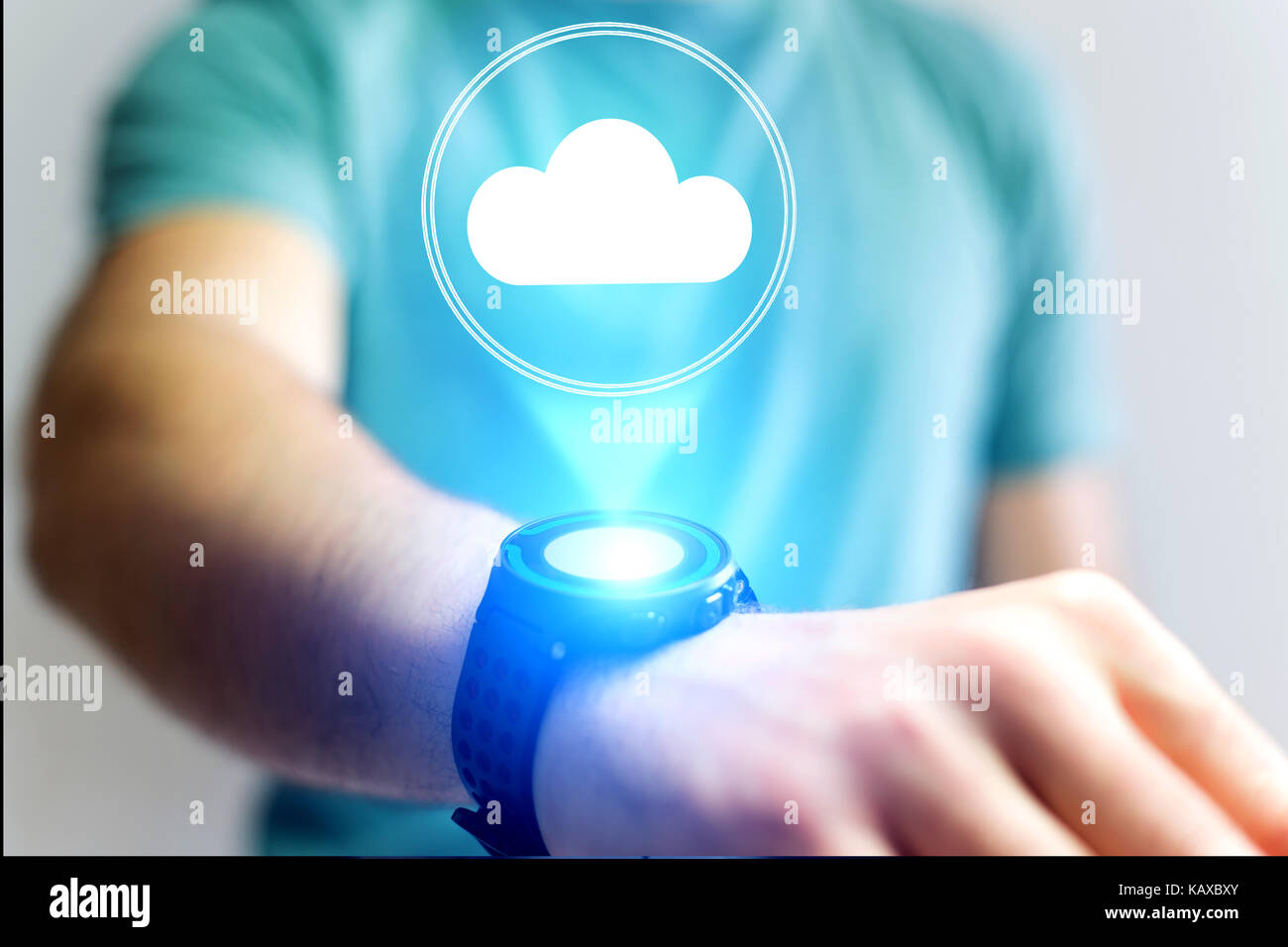 Concept view of cloud storage icon flying out a smartwatch - technology ...