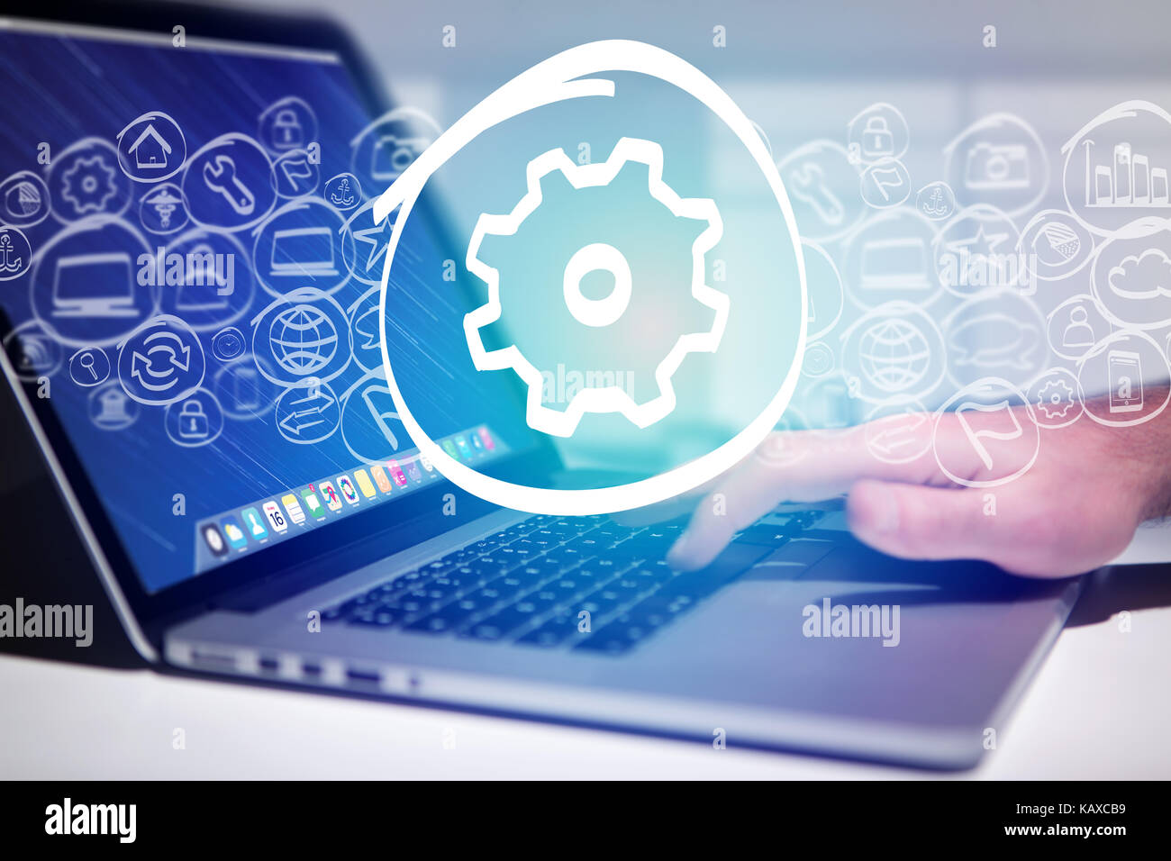 View of a Cog wheel icon going out a laptop interface - technology ...
