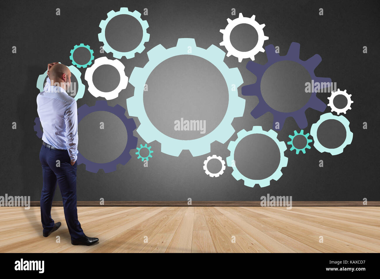 Businessman looking cog hi-res stock photography and images - Alamy