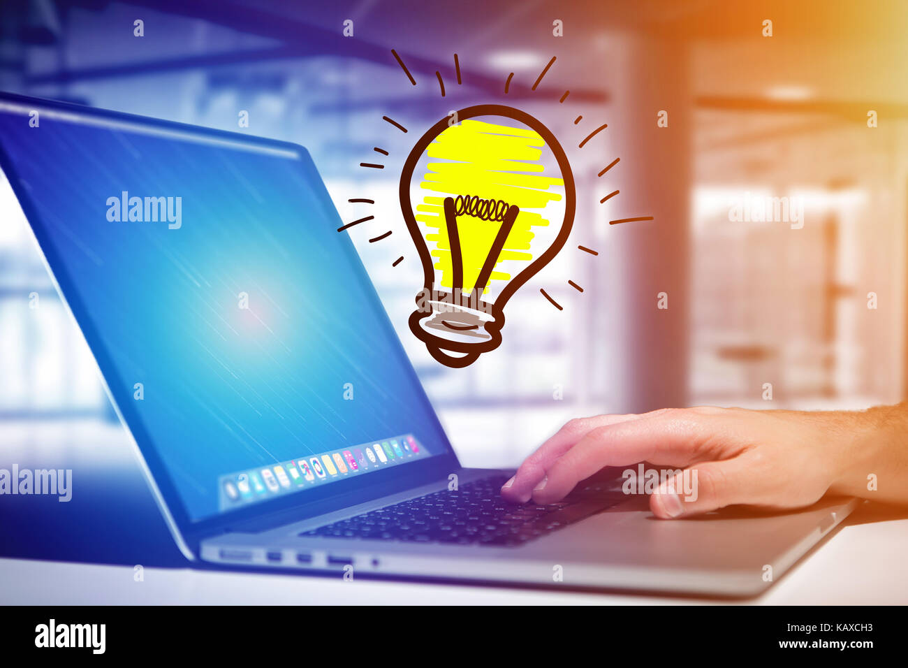 View of Hand drawn bulb lamp icon going out a computer interface of a ...