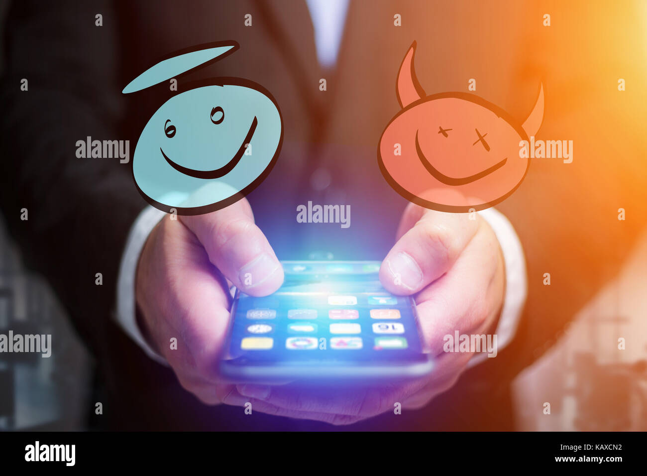 View of Hand drawn angel and demon icon going out a smartphone ...