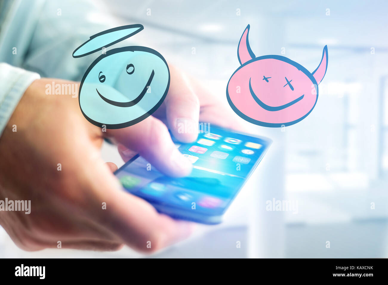 View of Hand drawn angel and devil icon going out a smartphone ...