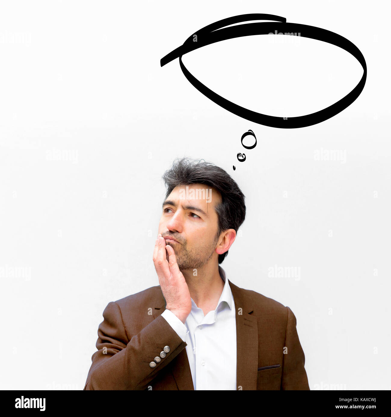 Portrait view of an attractive dubious business man with thinking ...