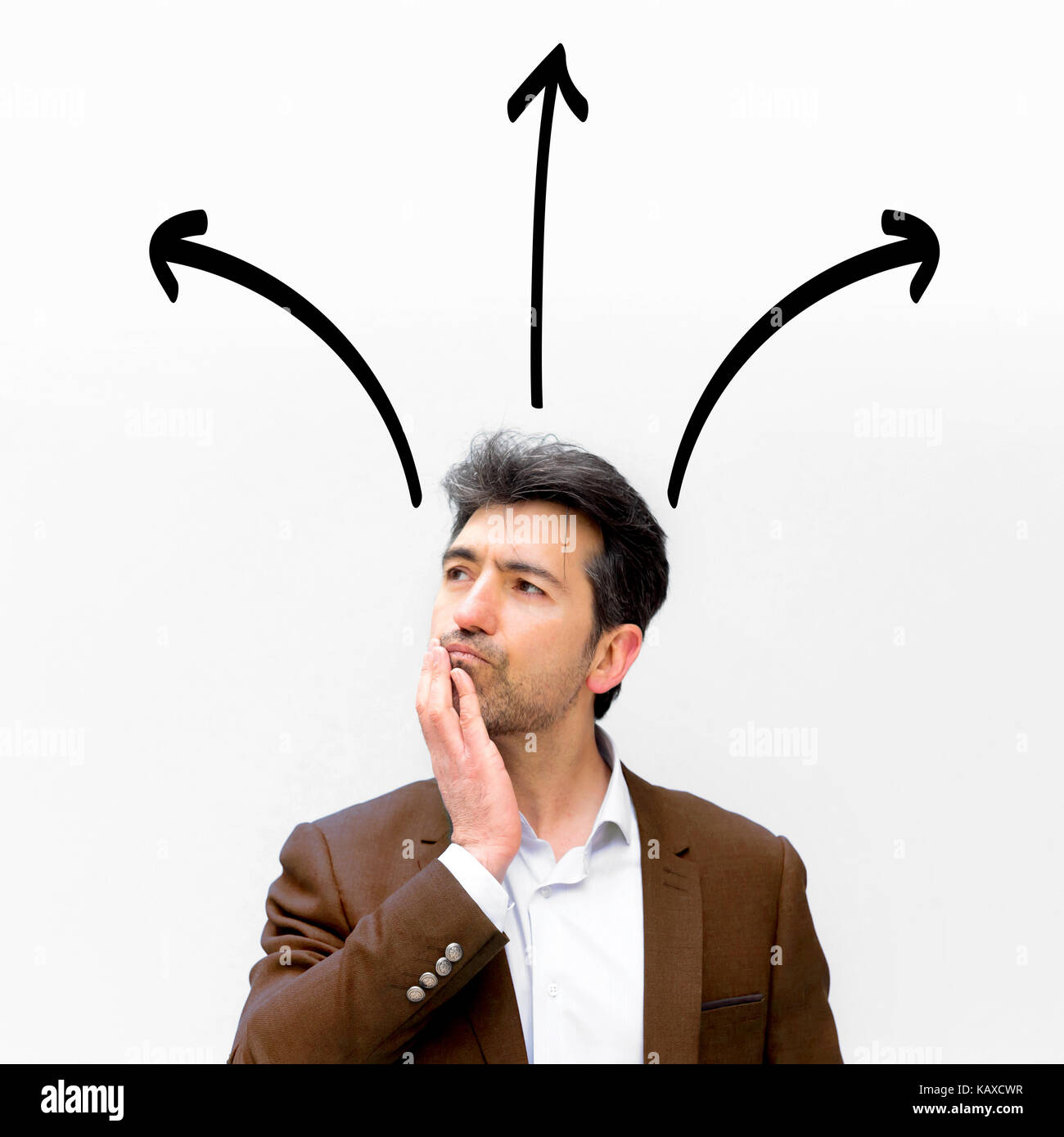 Portrait view of an attractive business man with arrows over his head ...