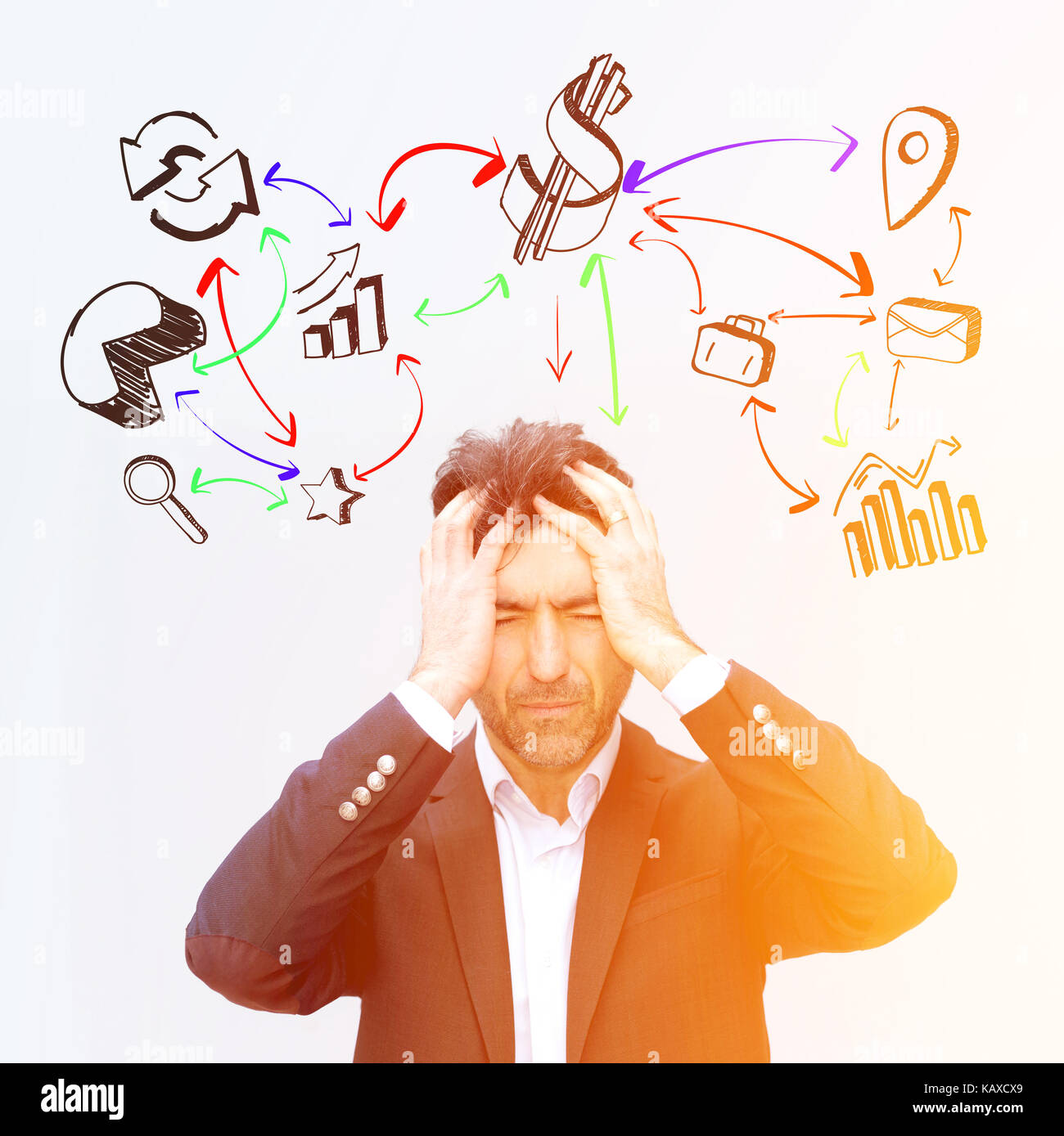 Portrait view of an attractive dubious business man with business icons ...
