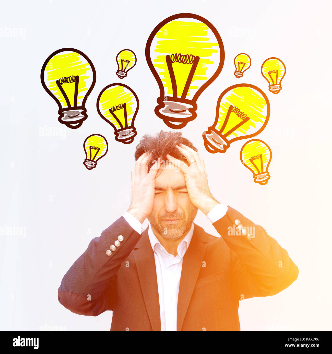 Portrait view of a businessman searching good idea with bulb lamp over ...