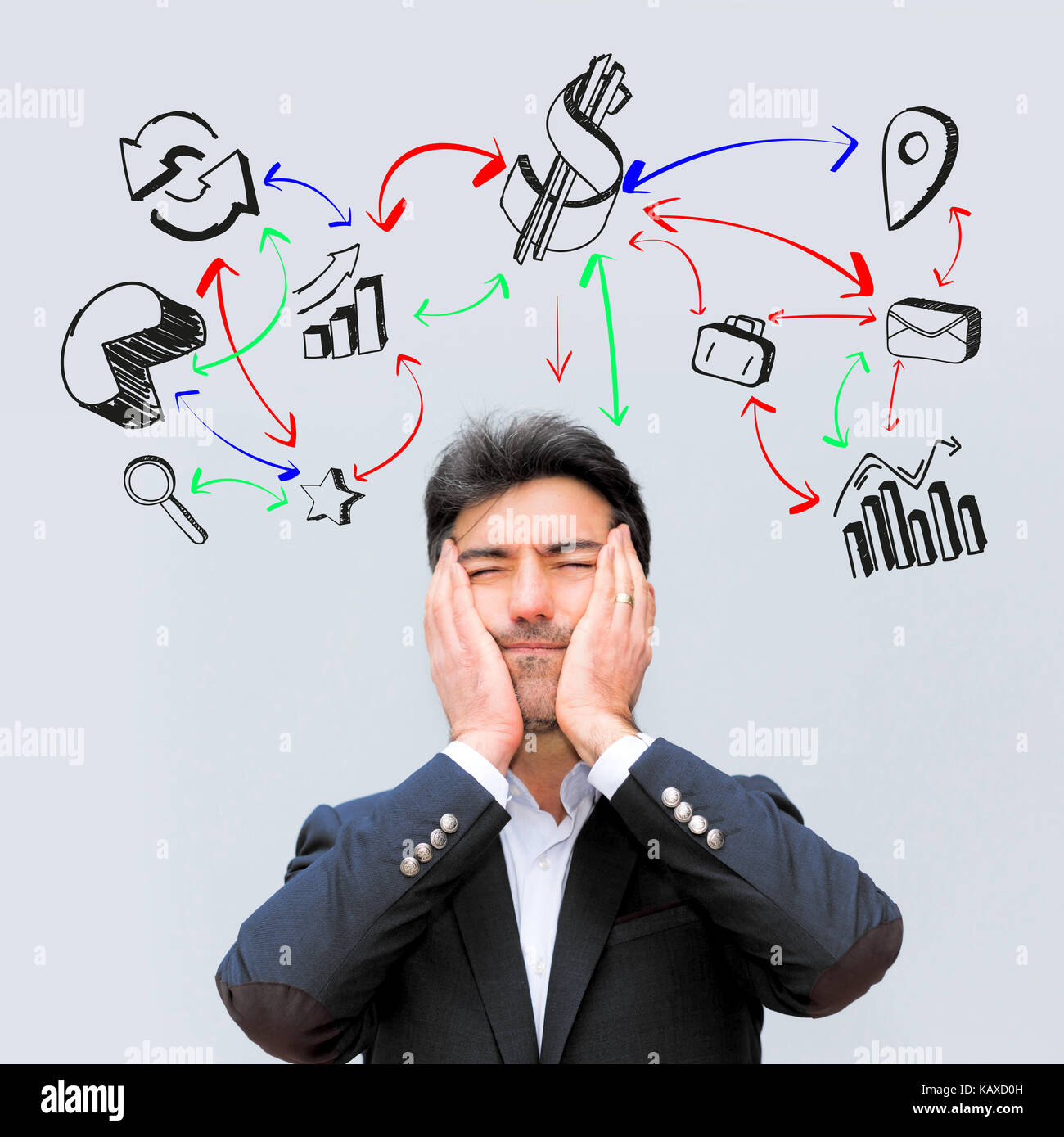 Portrait view of an attractive dubious business man with business icons ...