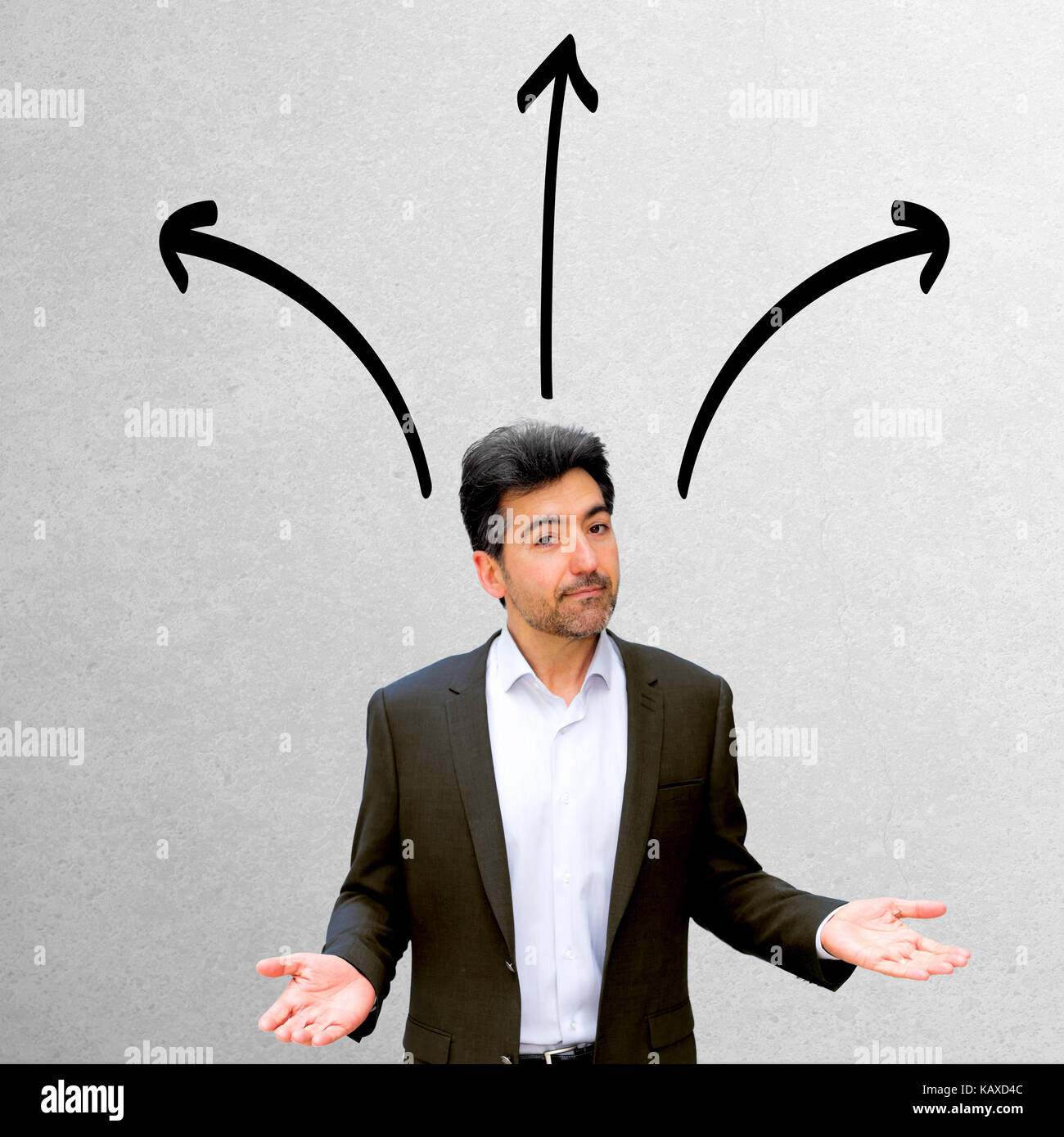 Portrait view of an attractive business man with arrows over his head ...