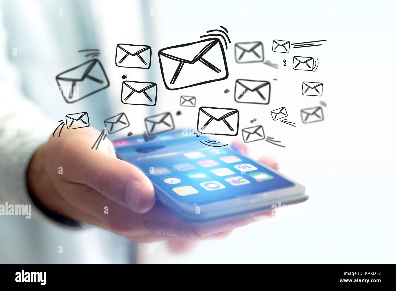 Concept view of sending email on smartphone interface with message icon ...