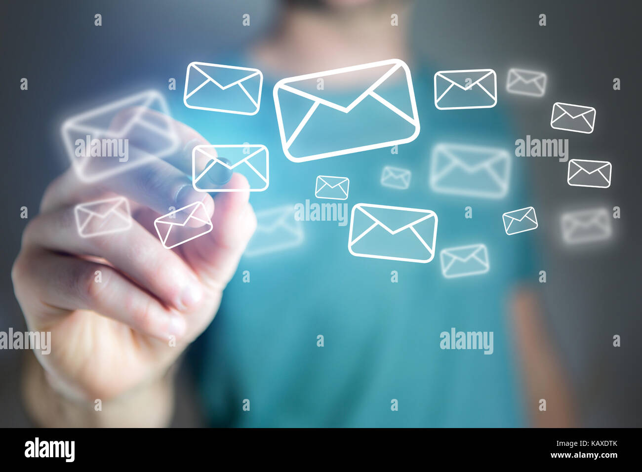 Concept view of man drawing email icon on technology interface Stock ...