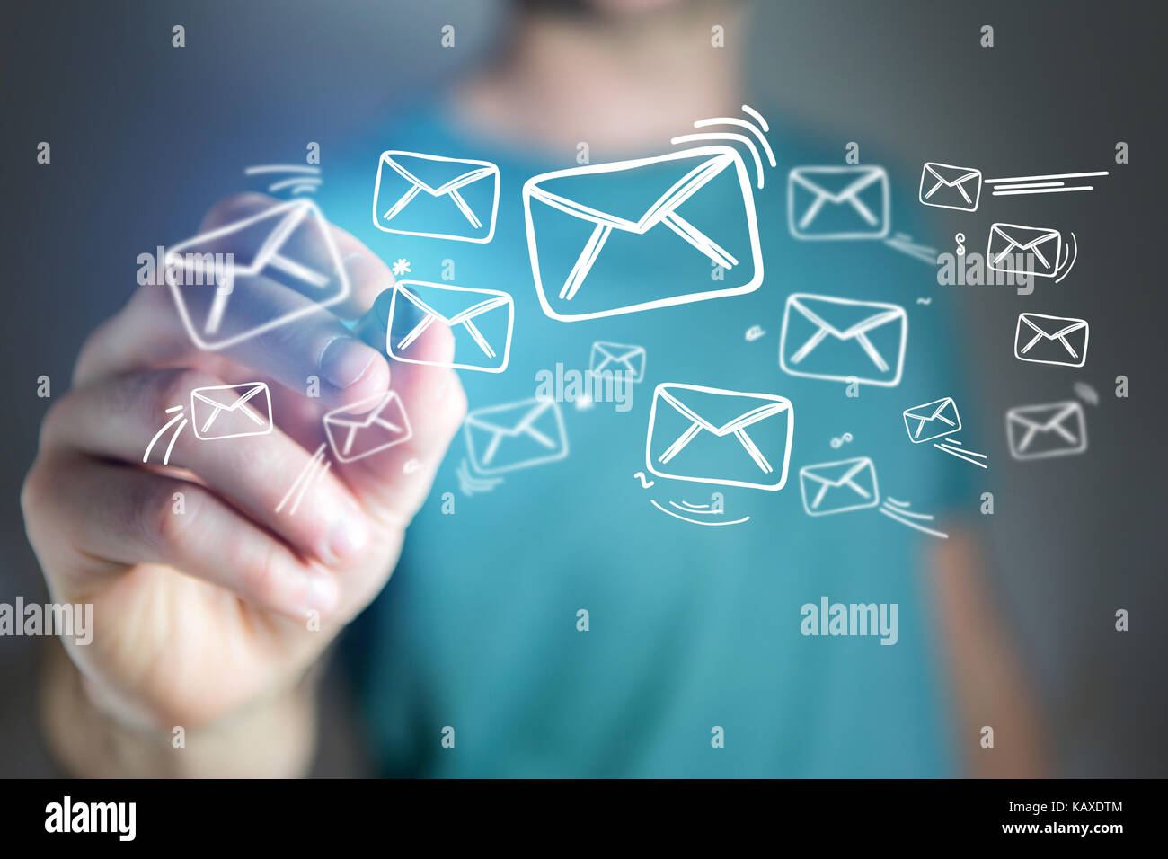 Concept view of man drawing email icon on technology interface Stock ...