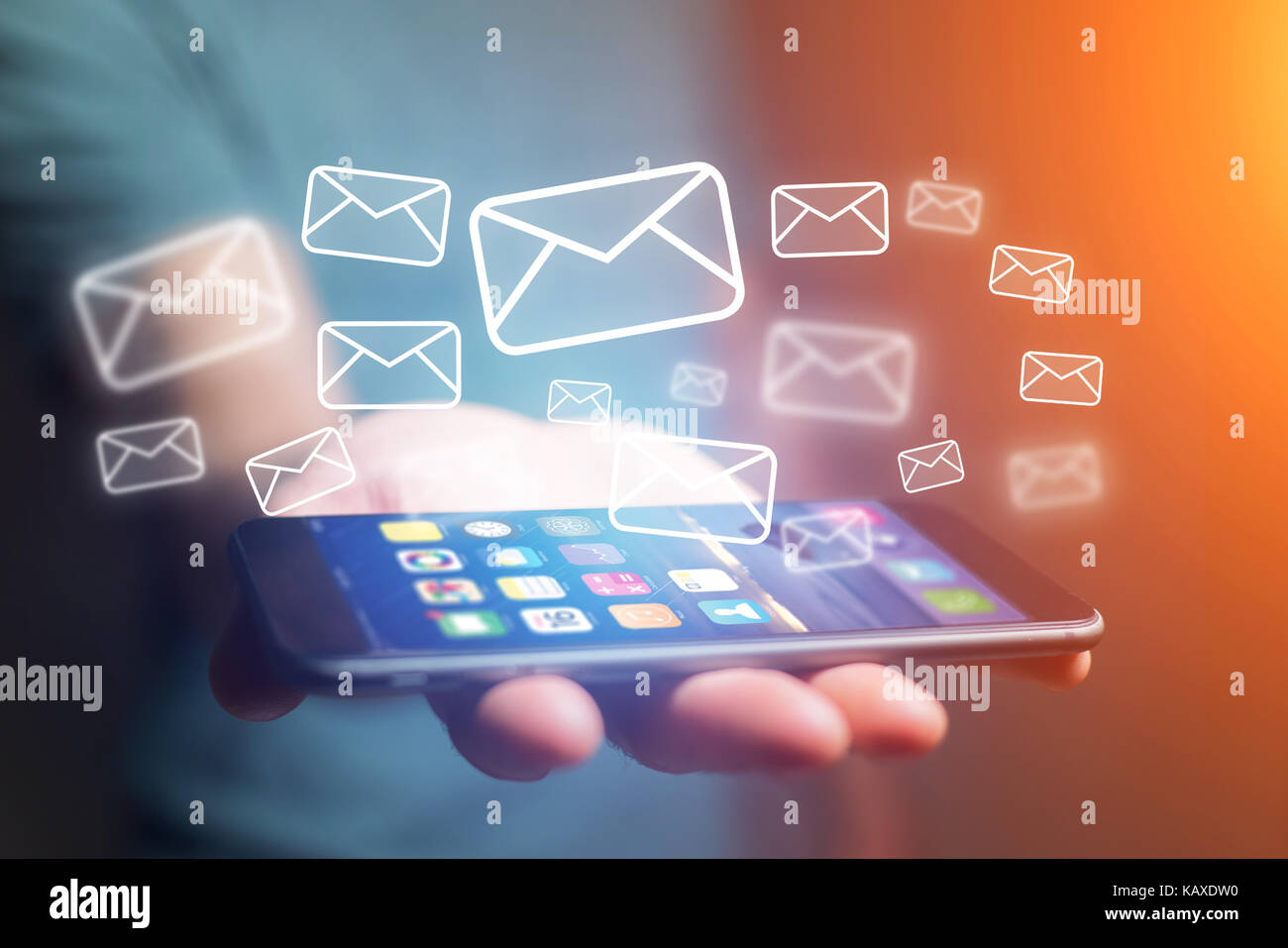 Concept view of sending email on smartphone interface with message icon ...