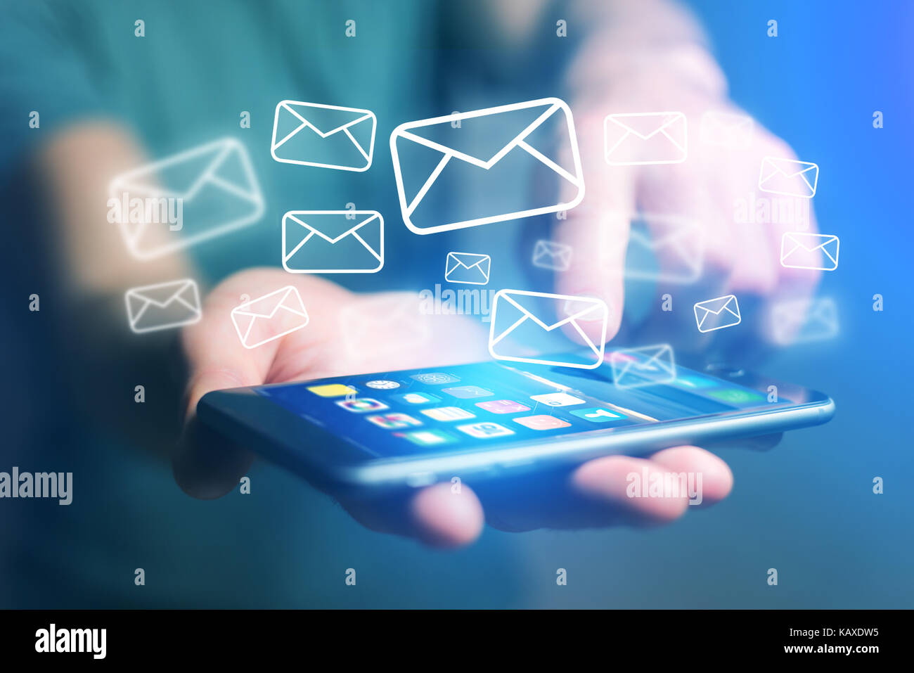 Concept view of sending email on smartphone interface with message icon ...