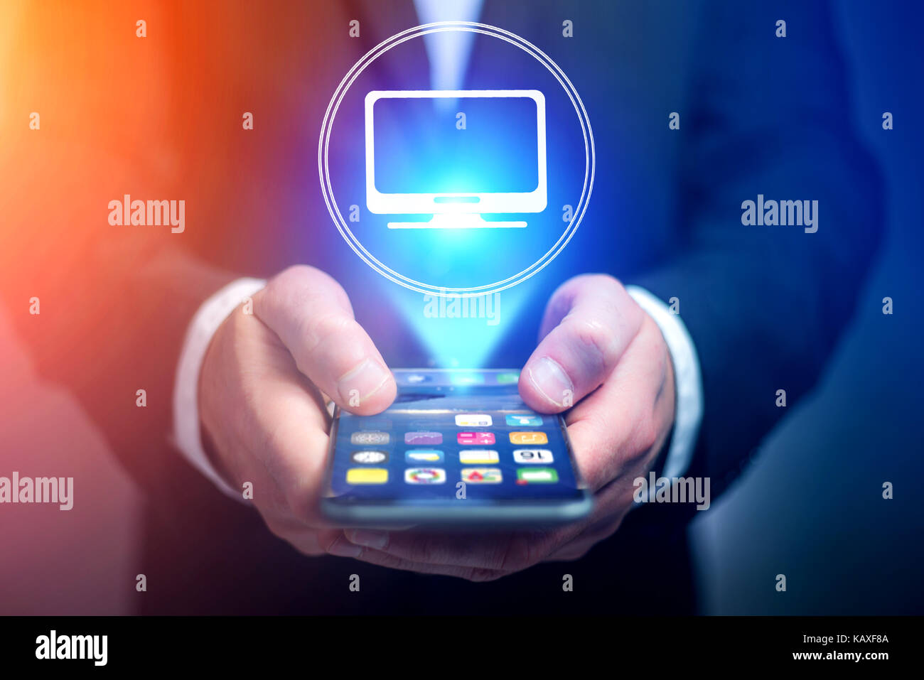 View of a Businessman hand holding mobile phone with computer icon ...