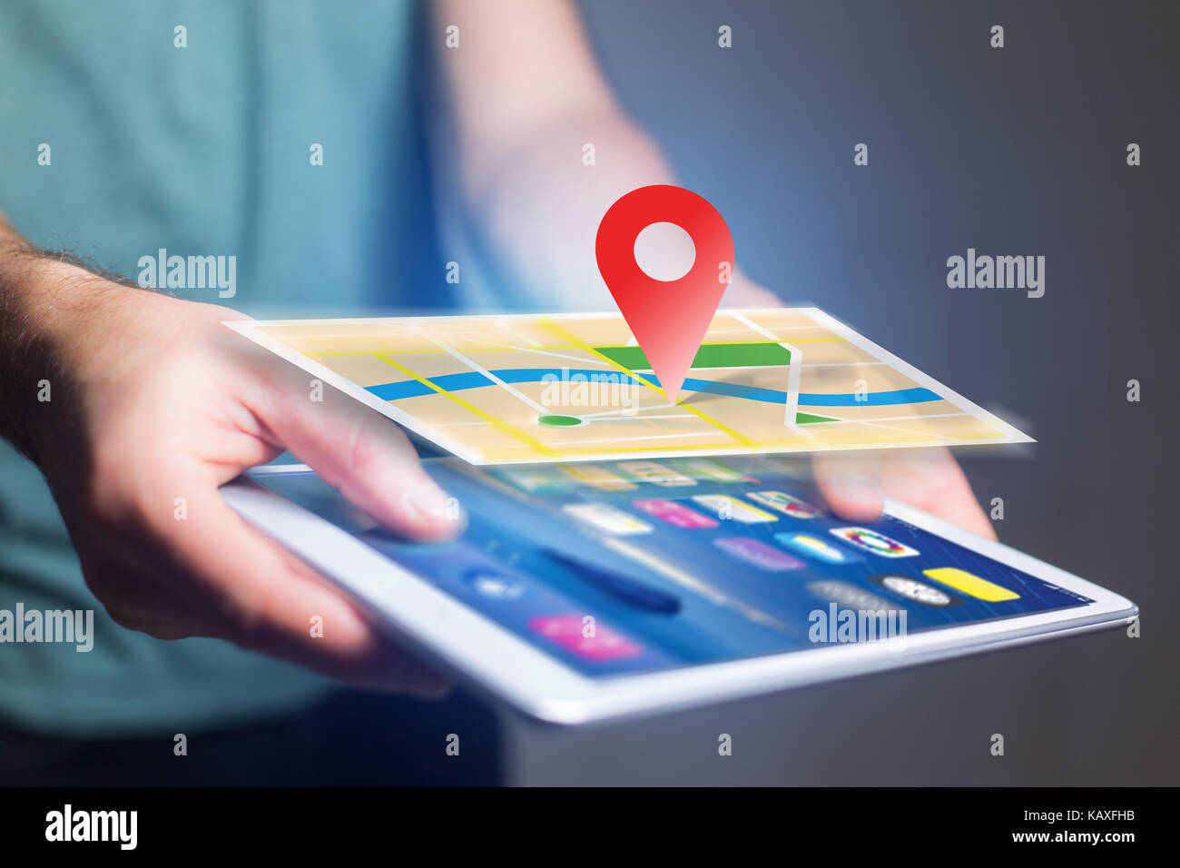 View of a Concept of geographical localization on a map with a tablet ...