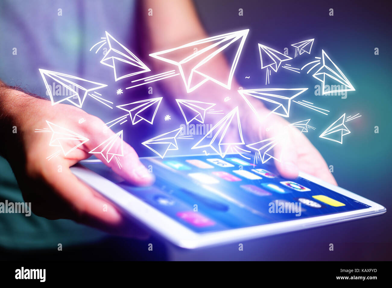 Concept view of creativity with flying paper plane over a tablet Stock ...