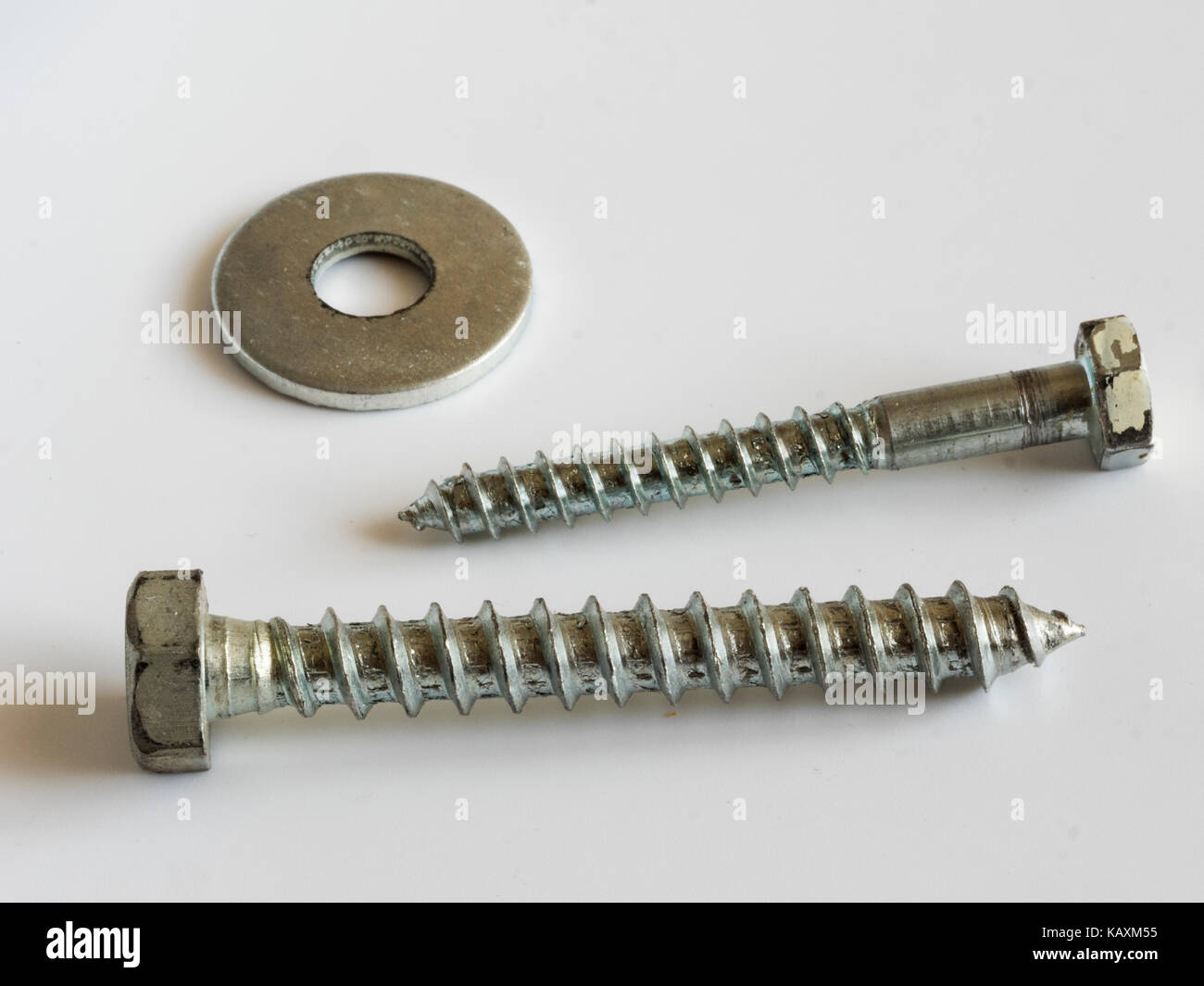 Bolt with washer isolated on white background Stock Photo - Alamy