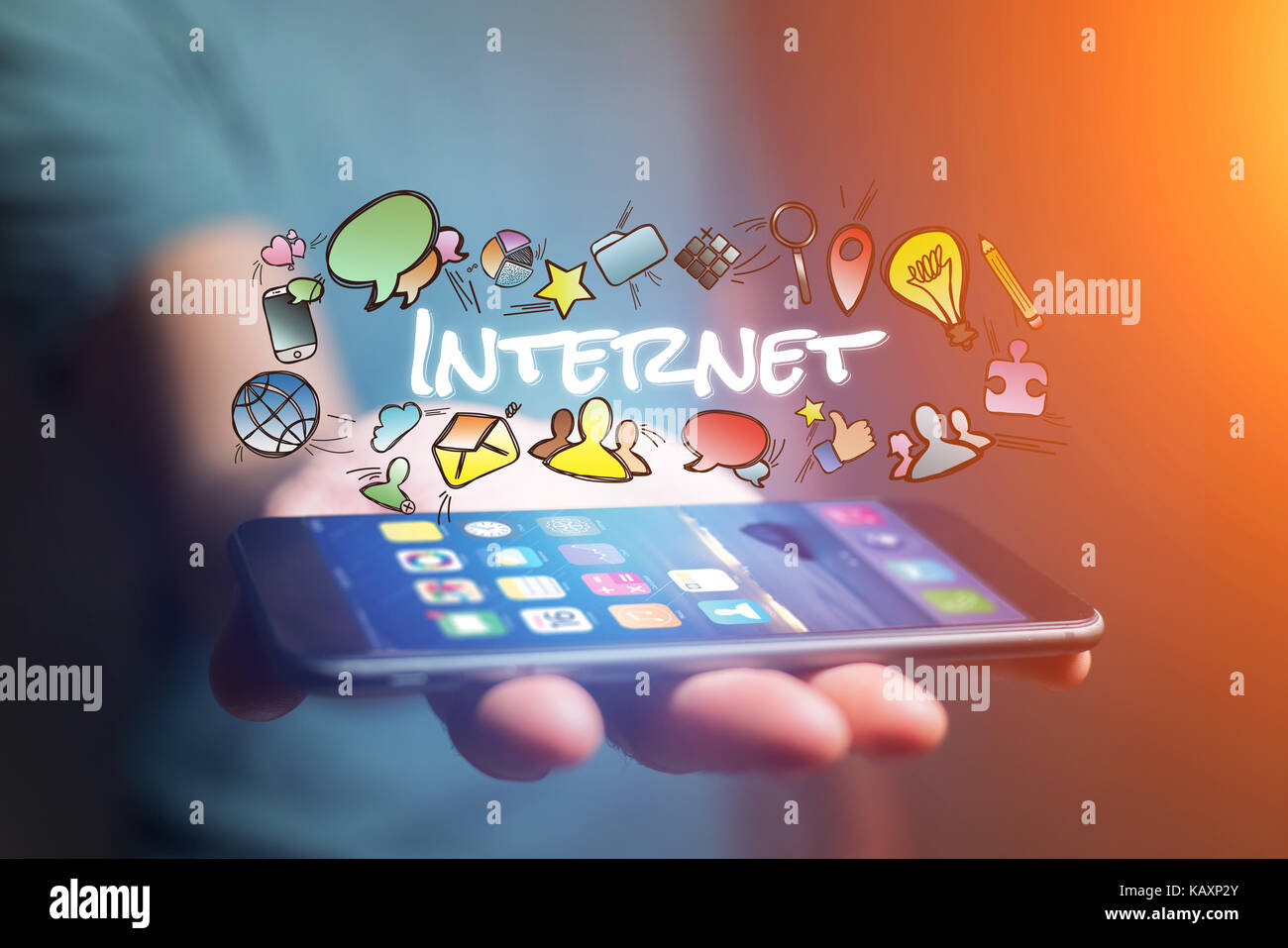 Concept view of man holding smartphone with internet title and ...