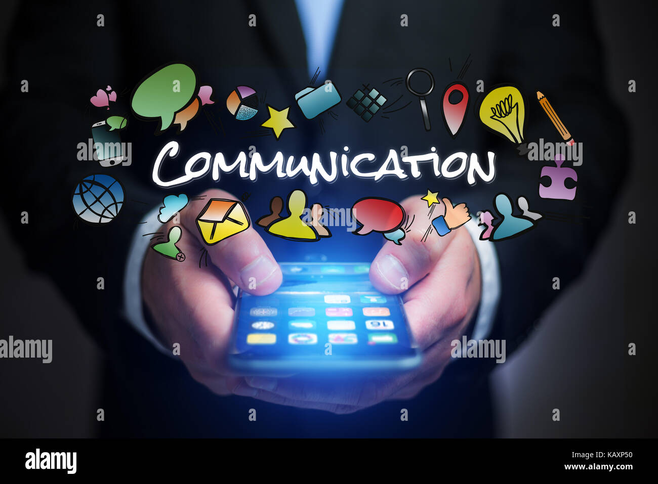 Concept view of man holding smartphone with communication title and ...