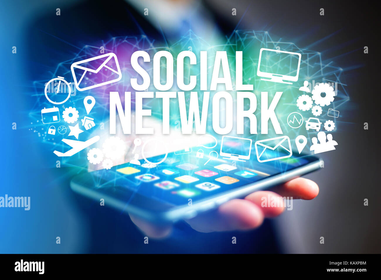 Concept view of man holding futuristic interface with social network ...