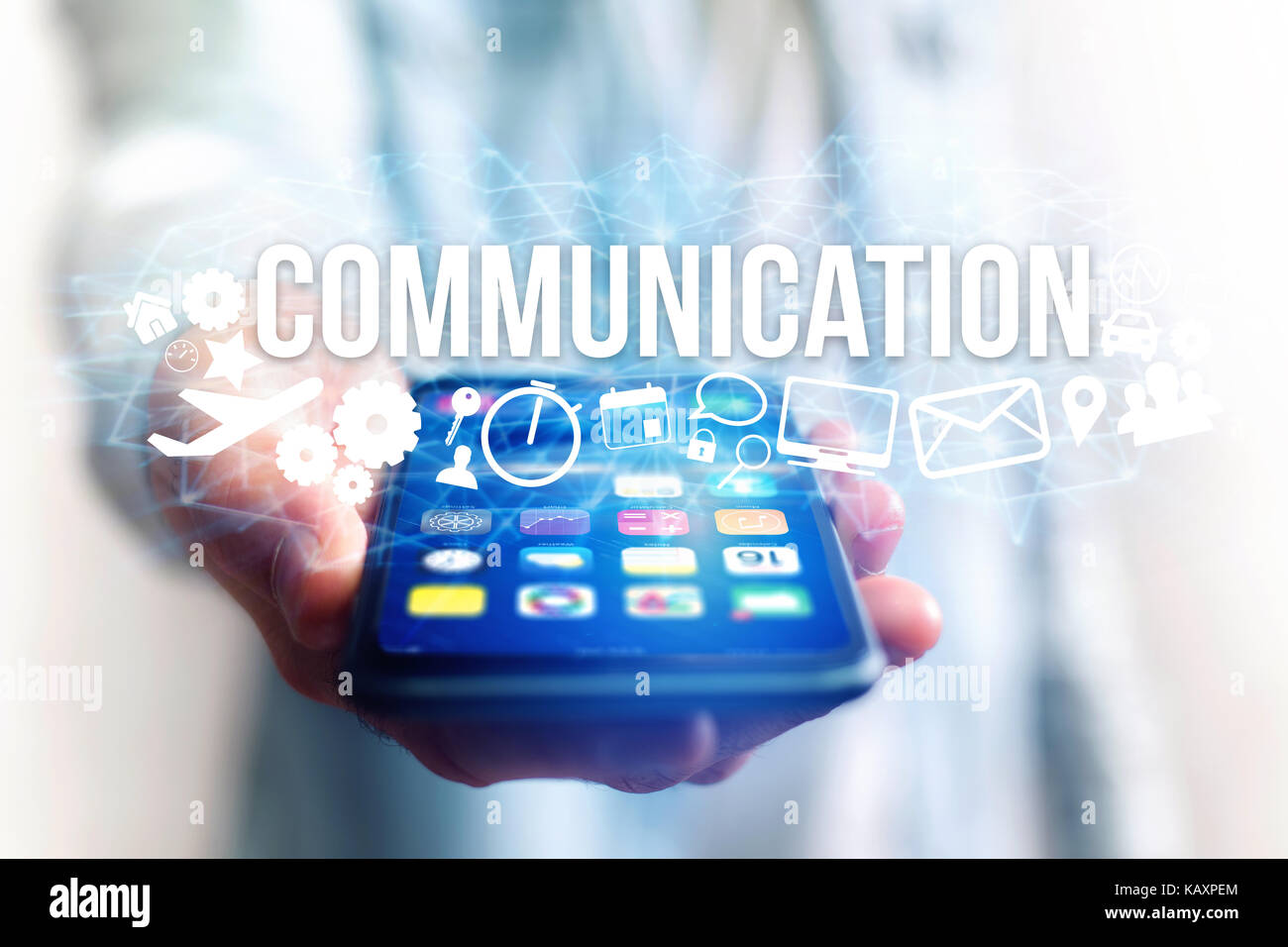 Concept view of man holding a futuristic interface with communication ...