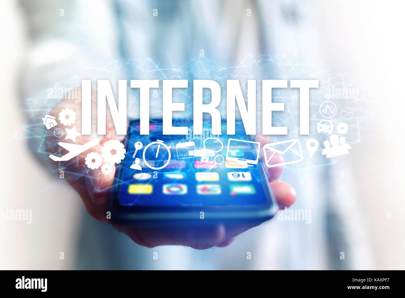 Concept view of man holding futuristic interface with internet title ...