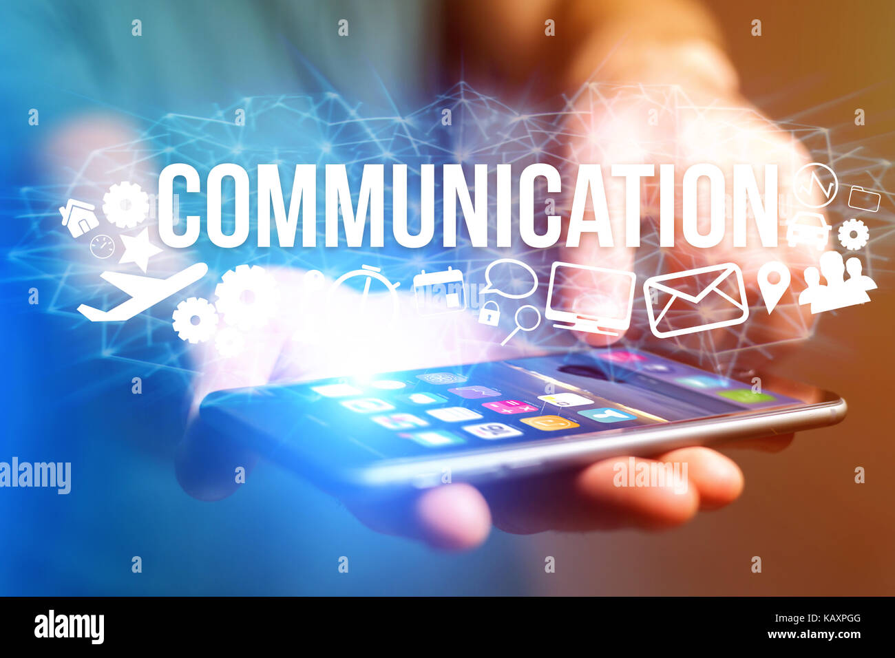 Concept view of man holding a futuristic interface with communication ...