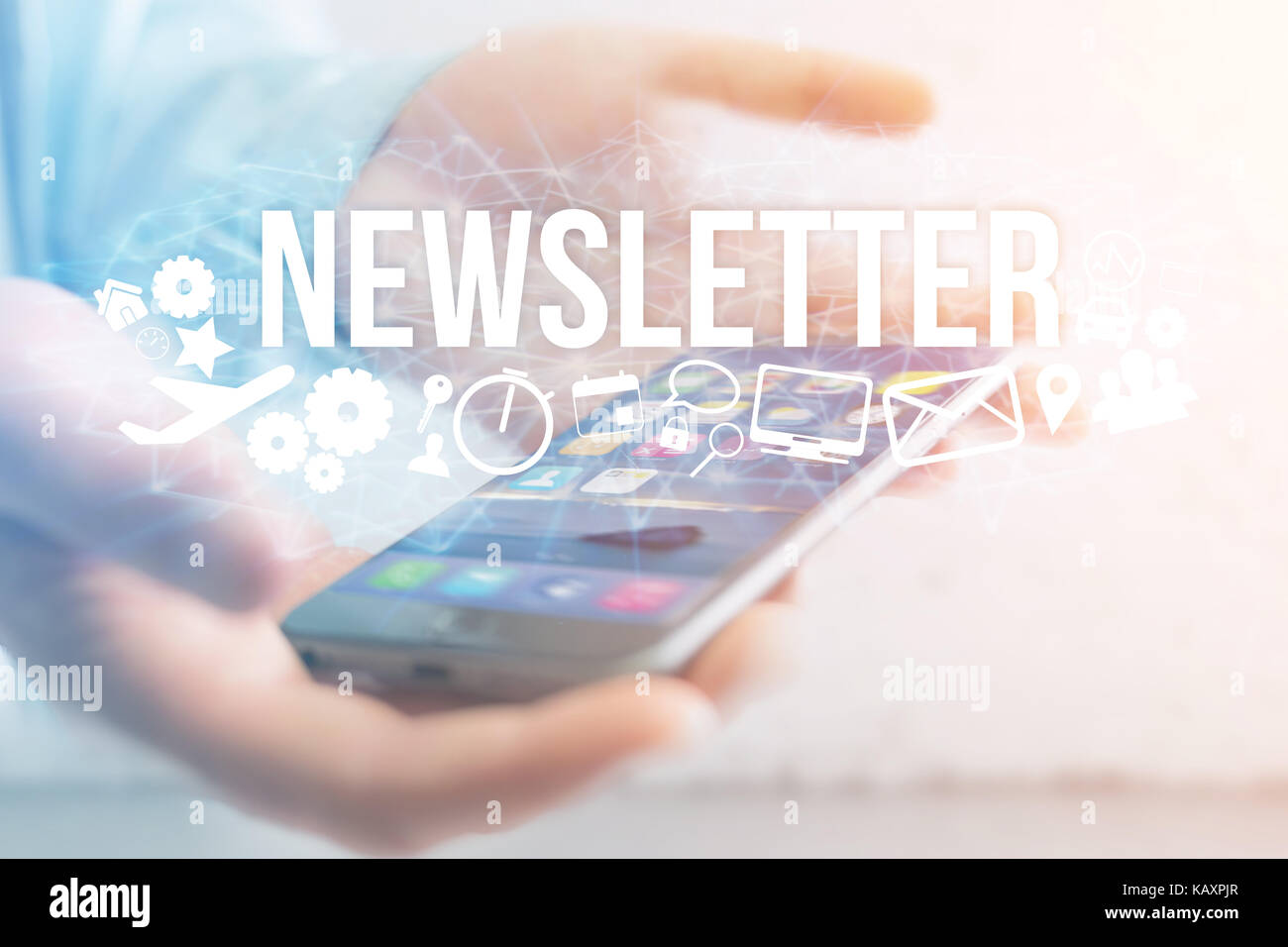 Concept view of man holding futuristic interface with newsletter title ...
