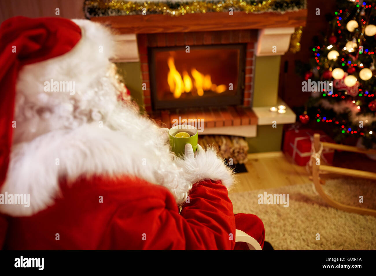 Santa Claus drinking hot tea for Christmas holiday Stock Photo - Alamy