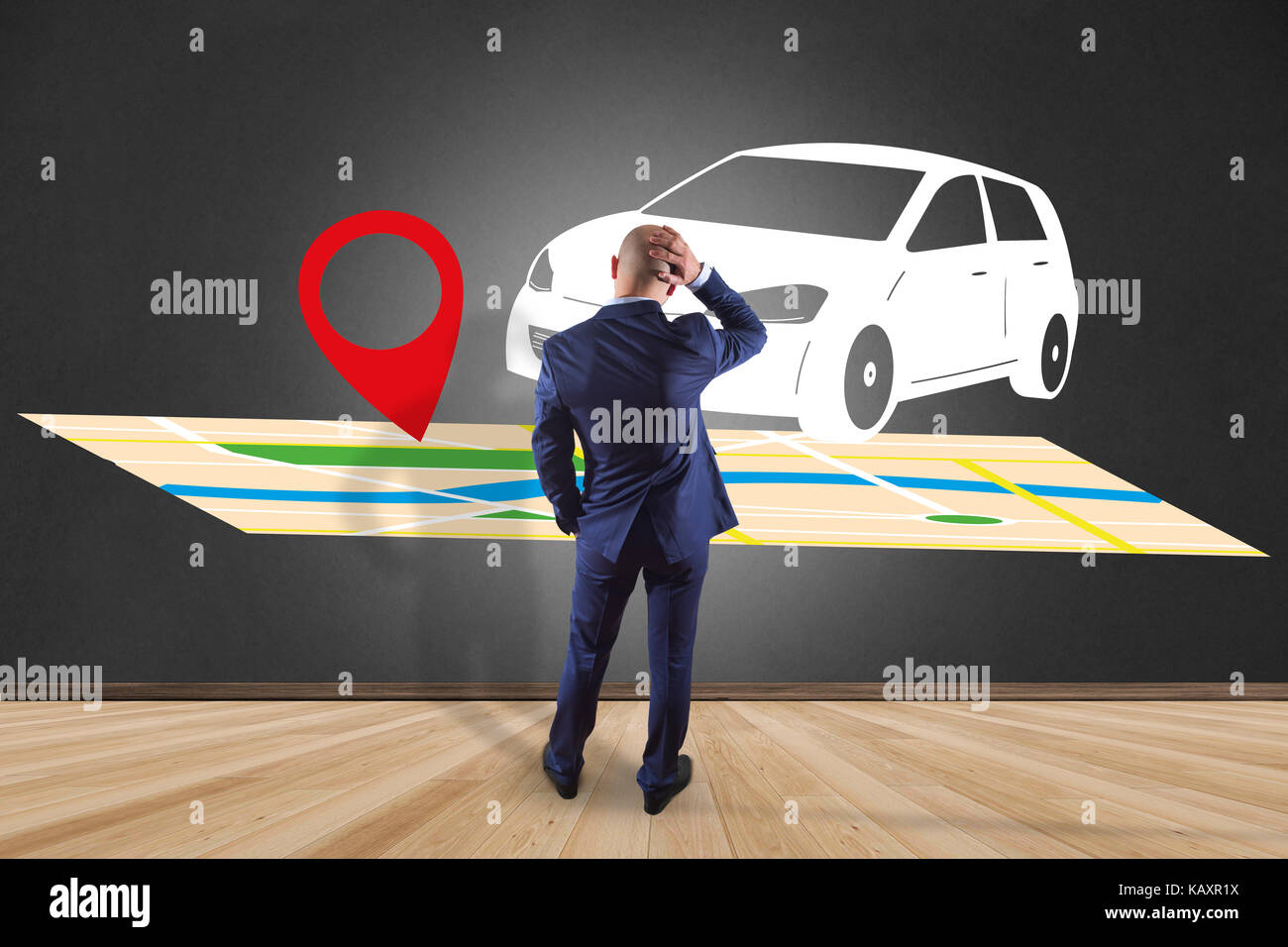 View of a Businessman in front of a wall with a Car on a map with a pin ...