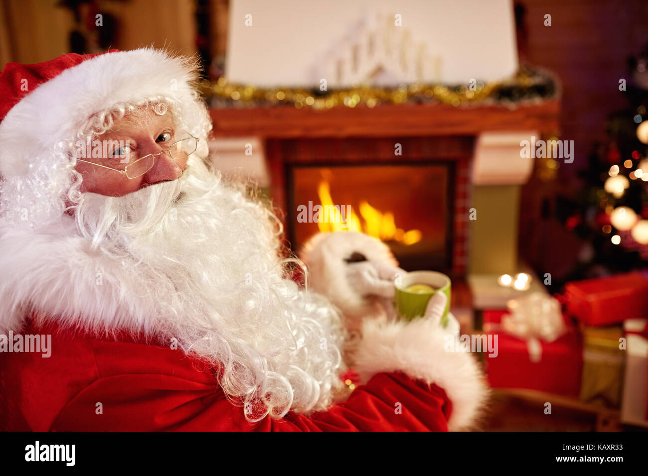 Portrait Santa Claus enjoying drinking hot tea for Christmas holiday ...