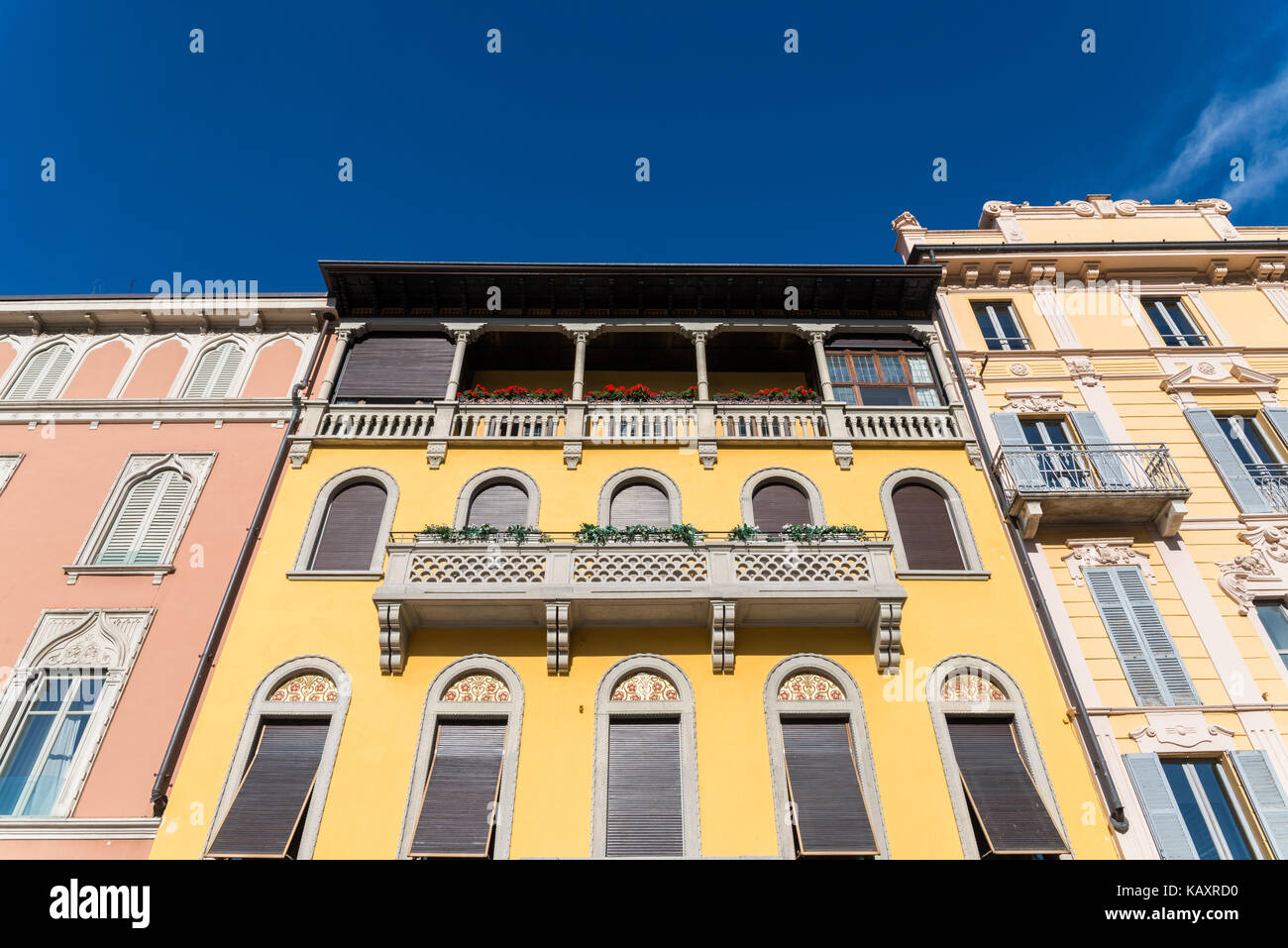 Colourful facade of traditional buildings in Como, Italy Stock Photo ...