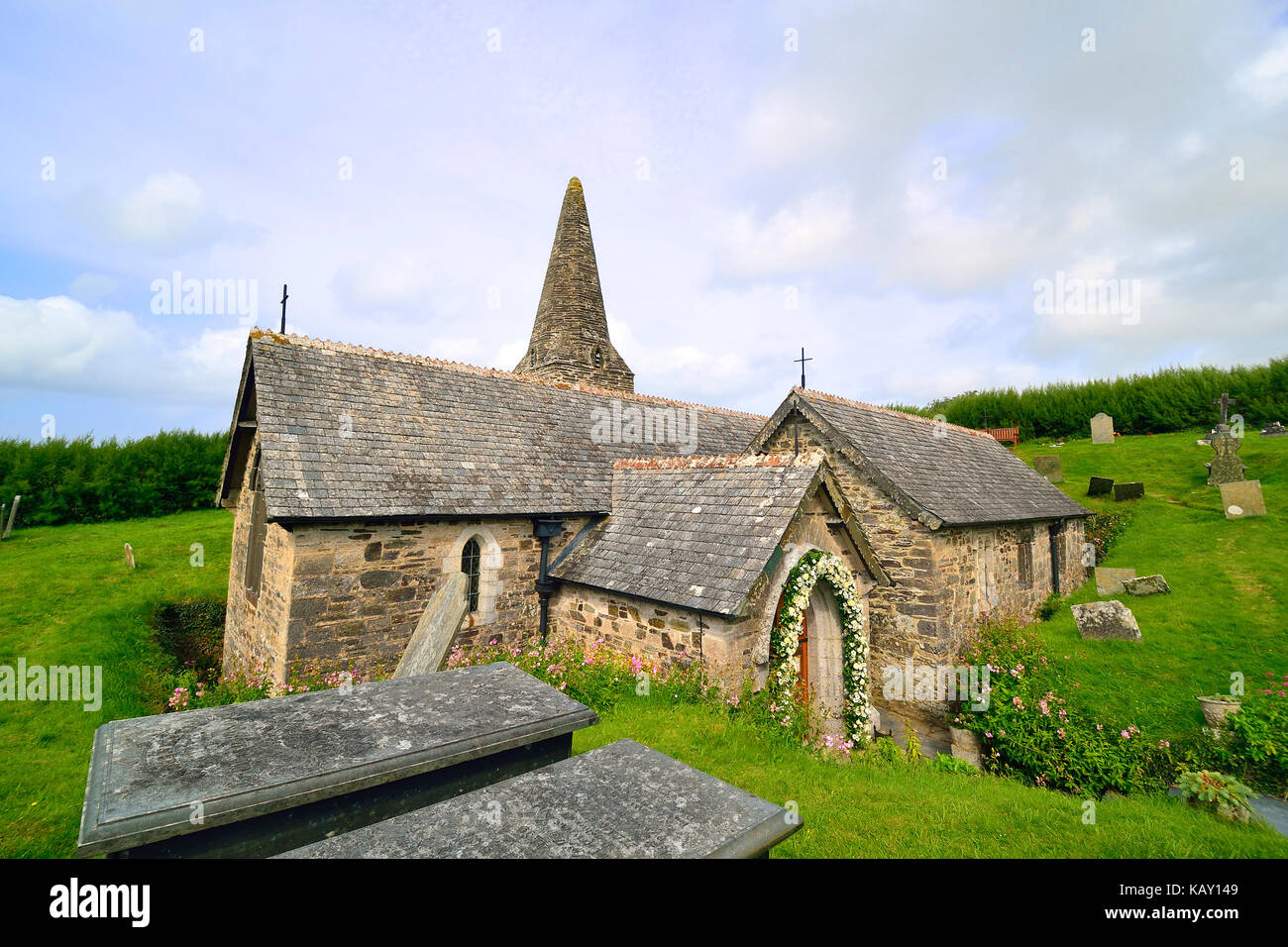 The churchyard of the tiny St Enodoc Church, Trebetherick, where Poet ...