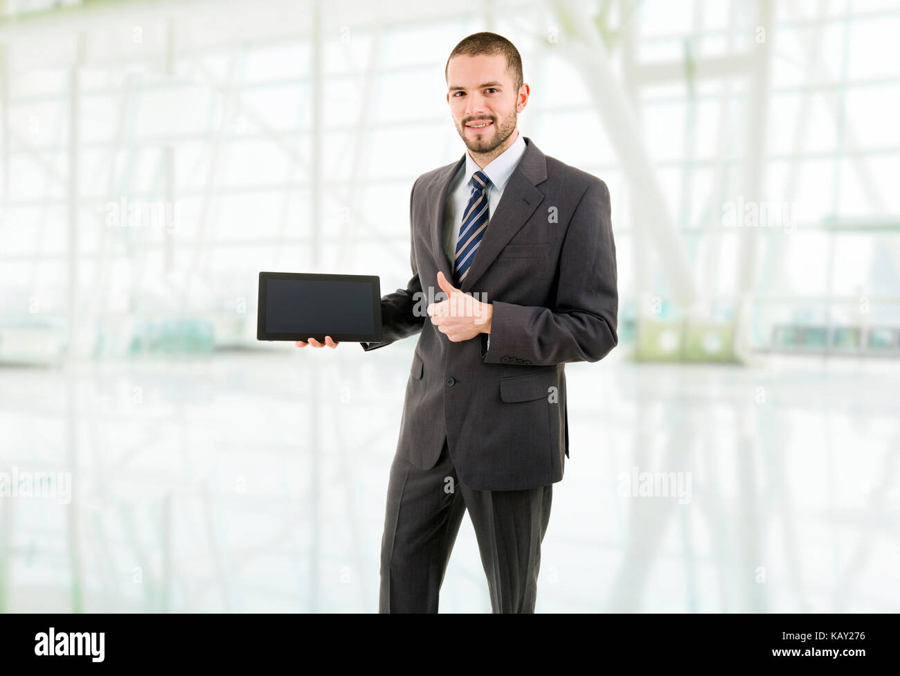 businessman using touch pad of tablet pc, at the office Stock Photo - Alamy