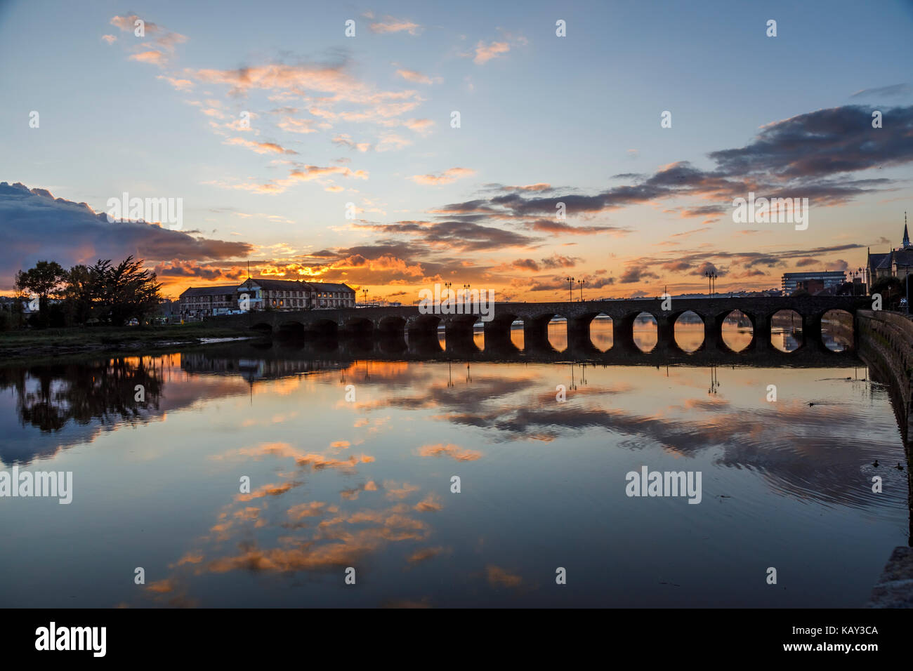 Medieval Long Bridge with reflection in the River Taw flowing into the ...