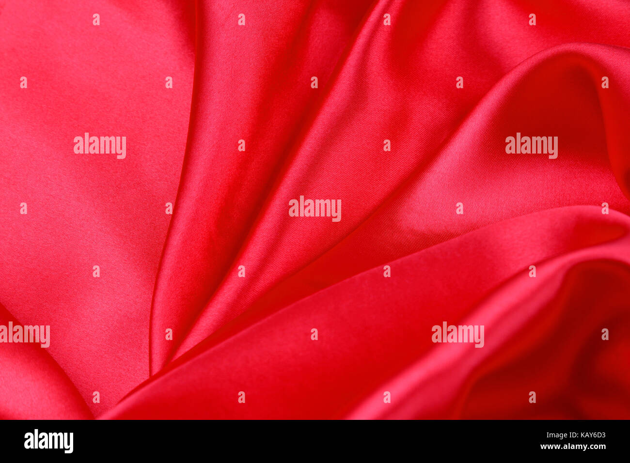 Closeup of ripples in red silk fabric Stock Photo - Alamy