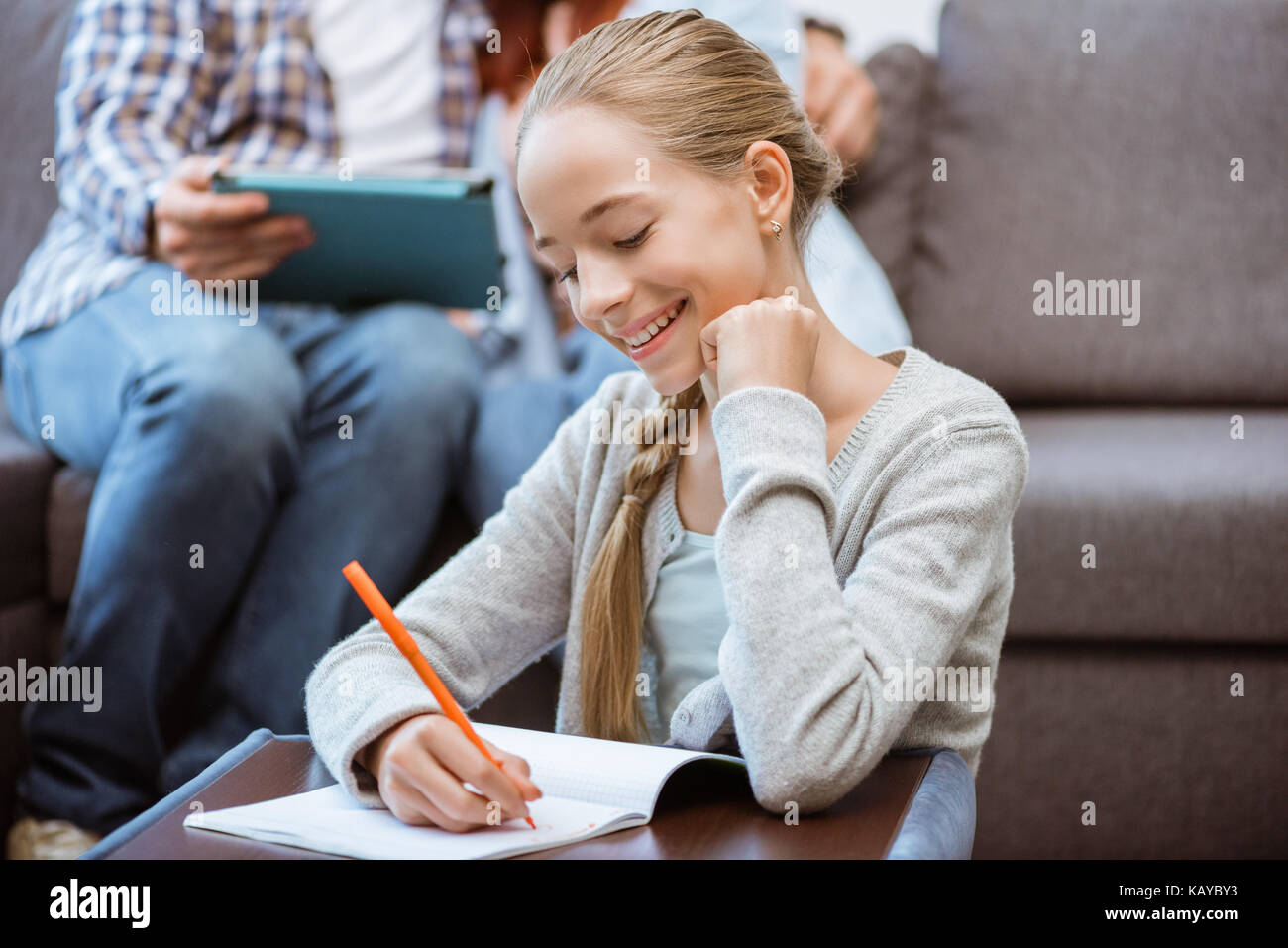 teenager doing homework Stock Photo - Alamy