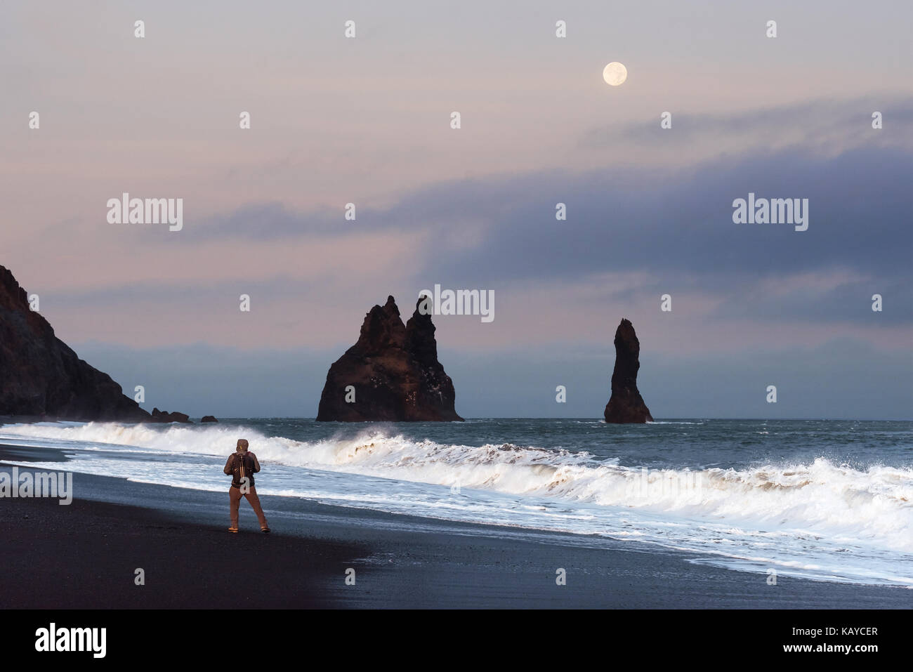 Famous Reynisdrangar rock formations at black Reynisfjara Beach. Coast ...