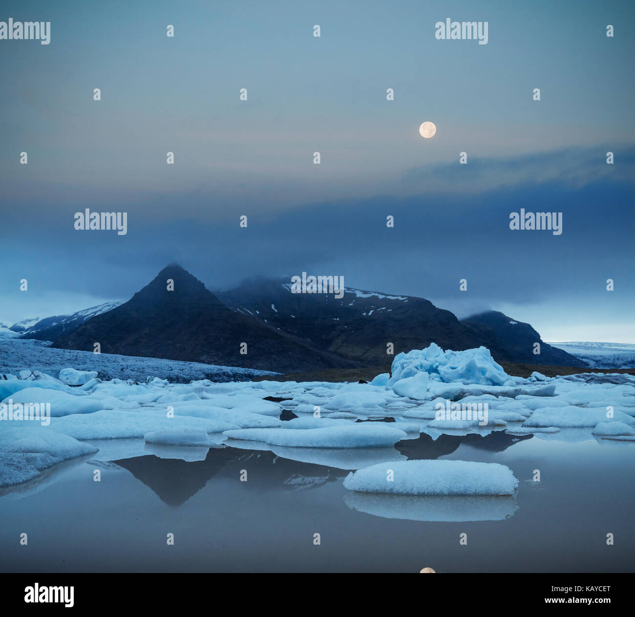 Famous Reynisdrangar rock formations at black Reynisfjara Beach. Coast ...