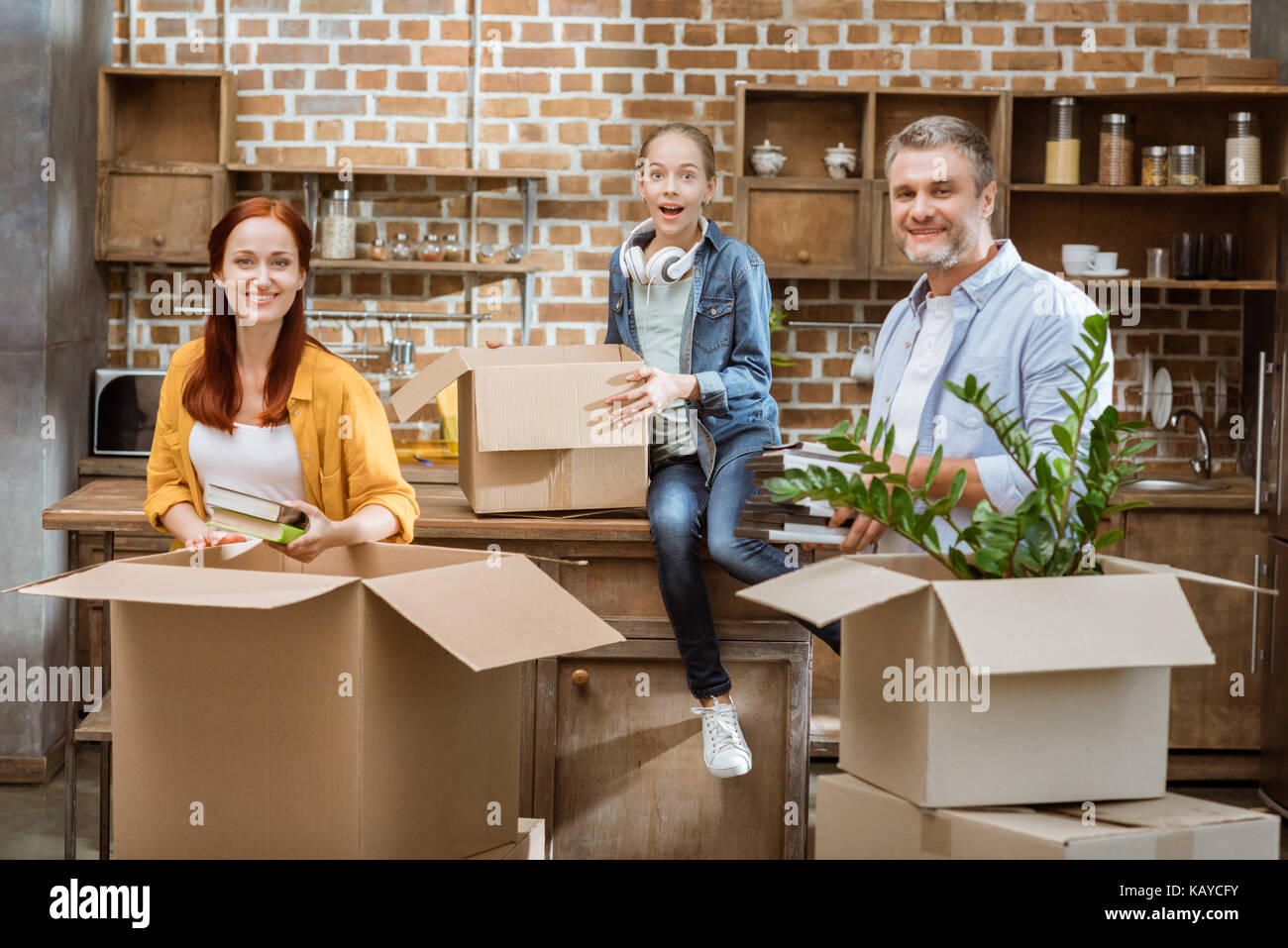 family moving to new home Stock Photo - Alamy