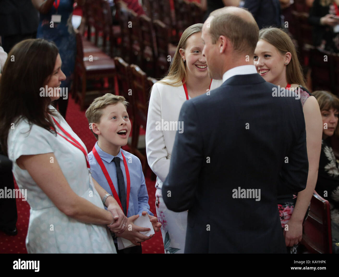 The Duke of Cambridge meeting (left to right) Sarah Cox with her family ...
