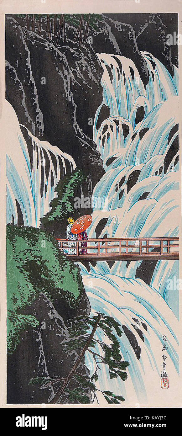 Bridge over waterfall Stock Photo - Alamy