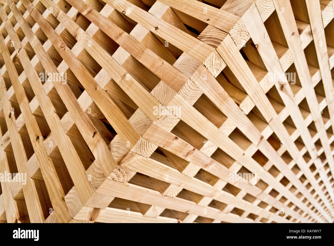 Detail of a cubic wood structure: many pieces joined together that form ...