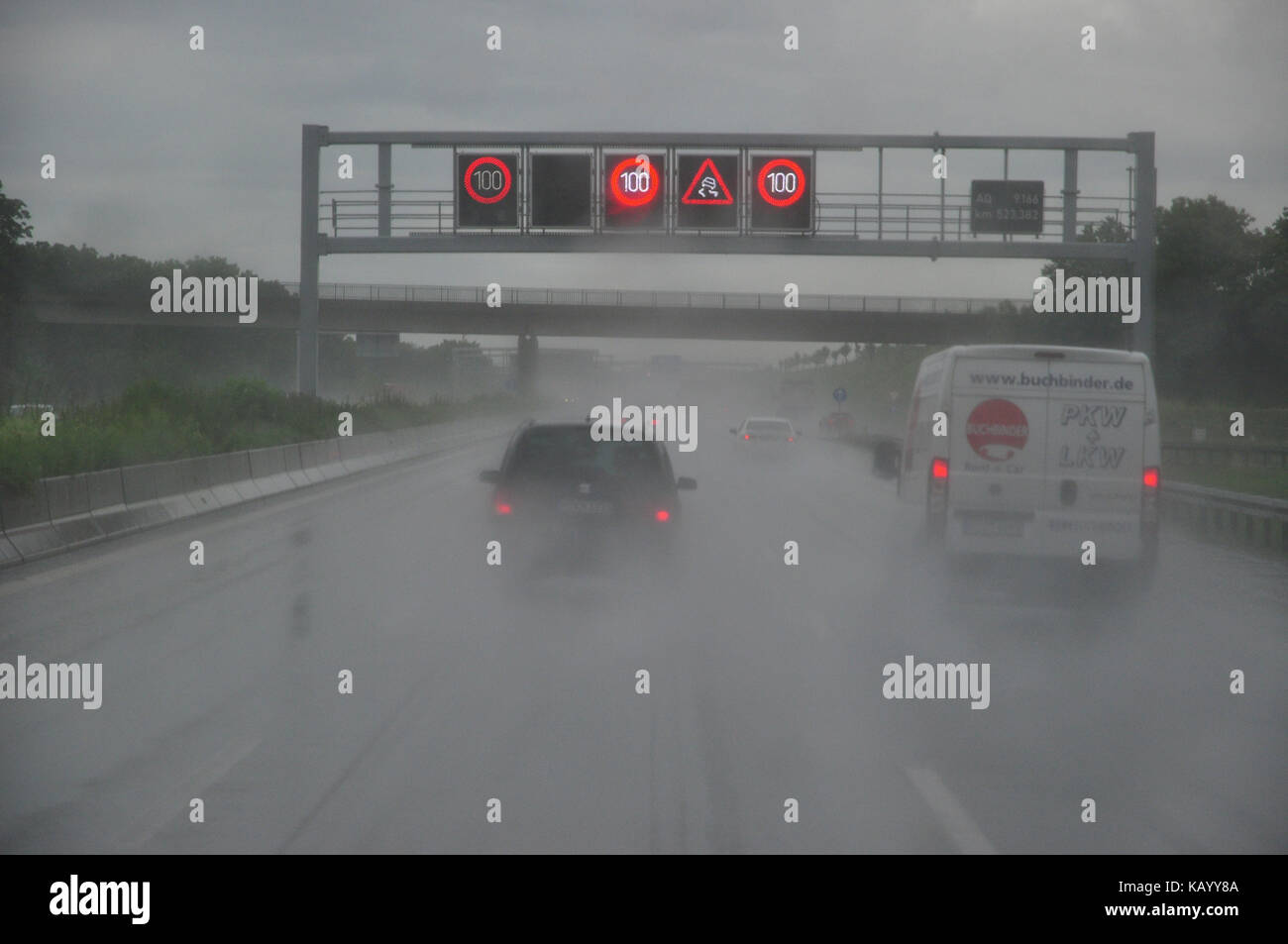 Germany, highway, rain, danger signs Stock Photo - Alamy
